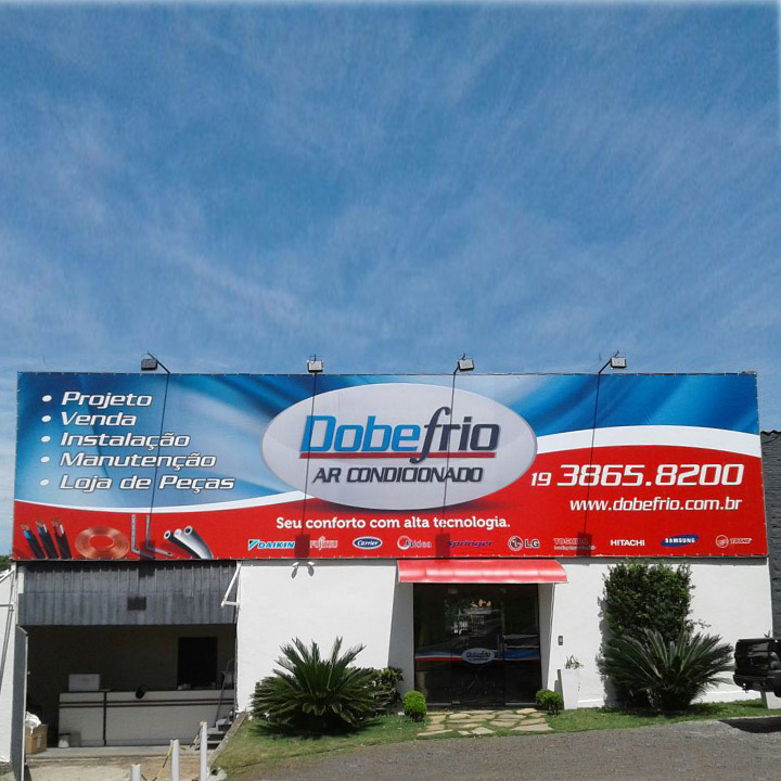 LONA PARA FACHADA COM ILHÓS PERSONALIZADA